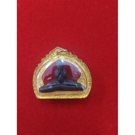 พระปิดตาบางแซะ หลวงพ่อครน วัดอุตมาราม กลันตัน มาเลเซีย พร้อมเลี่ยมพลาสติกกันน้ำ Shopee Thailand