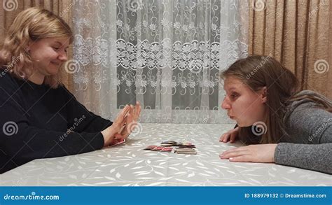 European Girls Play Uno Cards At Table Editorial Photography Image Of