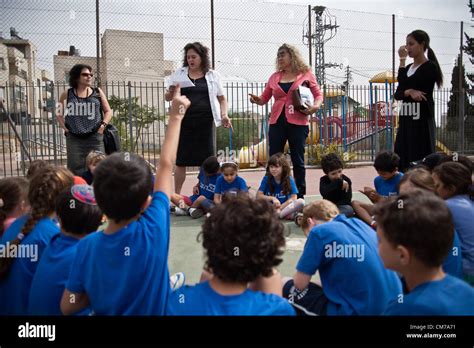 Teachers Check Attendance In School Yard To Make Sure All Pupils Are