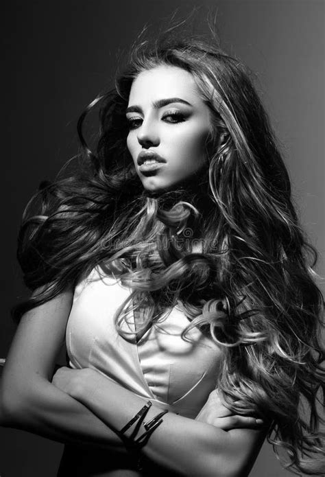 Portrait Of Beautiful Sensual Woman With Long Curly Hair Beauty Photo