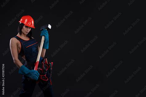 Sex Equality And Feminism Sexy Girl In Safety Helmet Holding Hammer Tool Attractive Woman