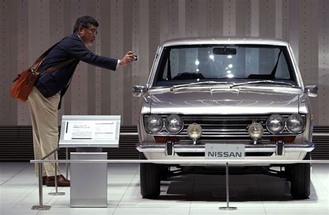 Nissan Cuts Profit Outlook Revamps Management Daily News