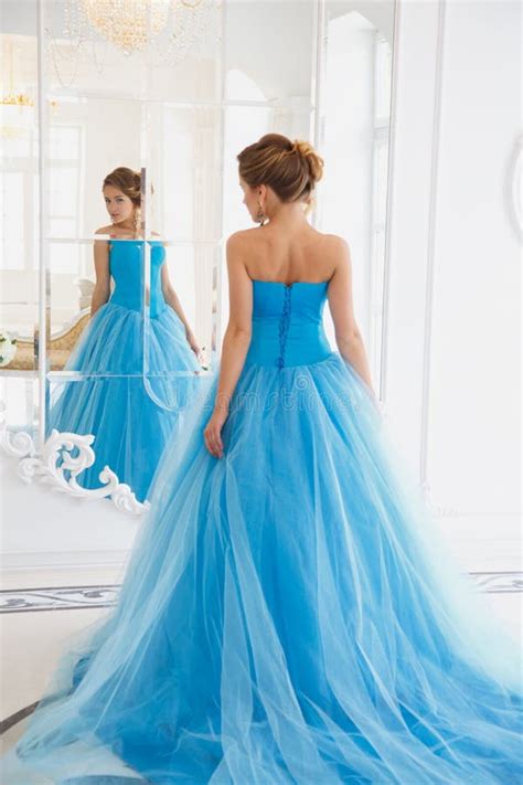 Beautiful Bride In Gorgeous Blue Dress Cinderella Style Near Mirror