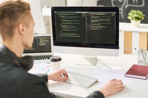 Premium Photo Man Coding In Office