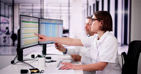 Hospital Doctor Using Spreadsheet For Billing Codes Stock Image Image