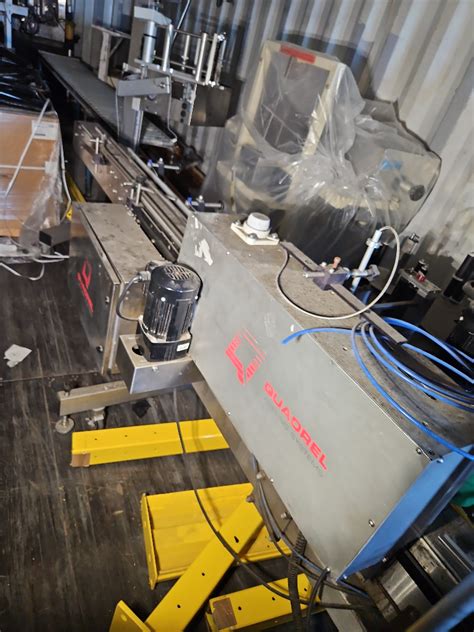 Used Quadrel Techline Vertical Can Wraparound Labeler