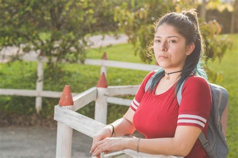 Premium Photo Beautiful Young Latina College Girl Waiting For Her