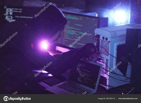 Side View Unrecognizable Cyber Security Hacker Wearing Hood While