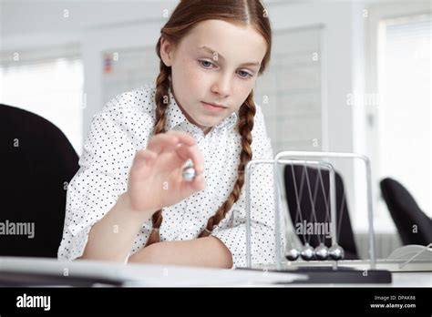 Newton S Cradle On Desk Hi Res Stock Photography And Images Alamy