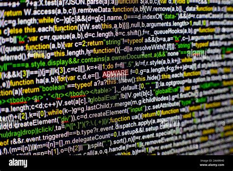 Macro Photo Of Computer Screen With Program Source Code And Highlighted