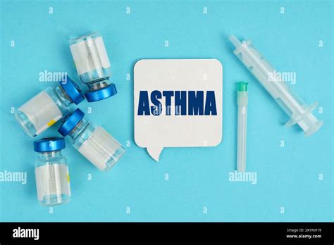 Medicine And Health Concept On The Table Is A Syringe An Injection And A White Plaque