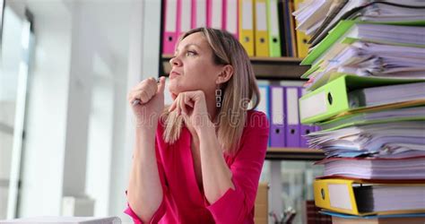 Thoughtful Female Employee Thinking About Project At Desk Stock Video Video Of Paperwork