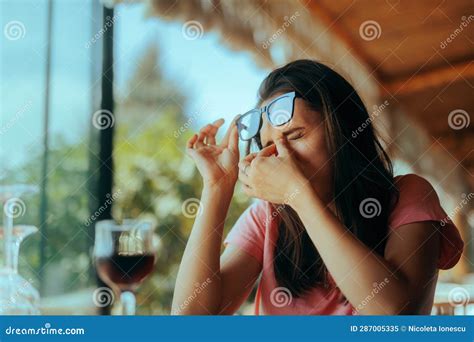 Woman Lifting Her Eyeglasses Rubbing Her Eyes Stock Image Image Of Discomfort Irritated