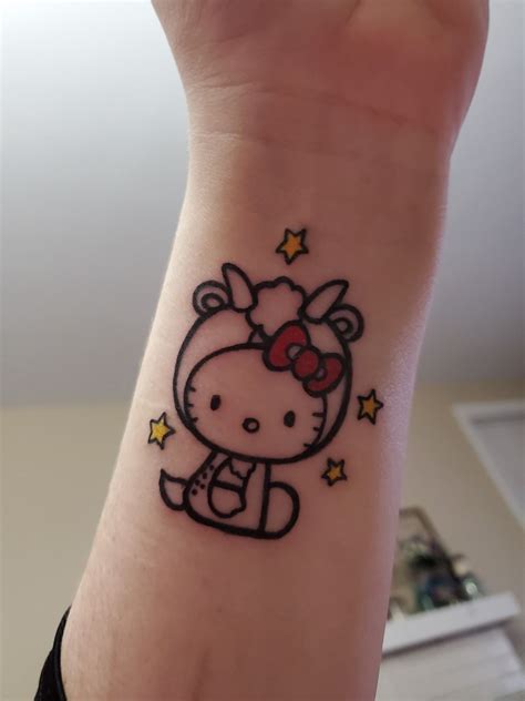 Hello Kitty Tattoos On Chest