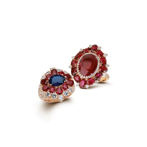 Pink Gold Royal Ruby Ring With Blue Sapphire Center