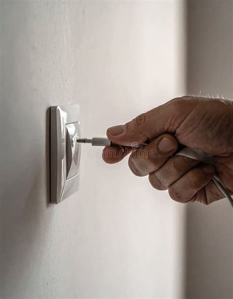 Hand Plugging A Power Cord Into A Wall Outlet Stock Illustration