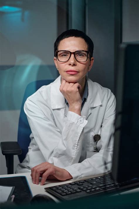 Female Scientist Conducting Scientific Experiment In Laboratory Stock