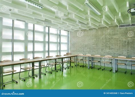 Modern Classroom Interior With White Board And Movable Tables And