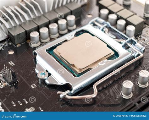 The Process Of Connecting The CPU To The Processor Socket On A Modern Computer Motherboard