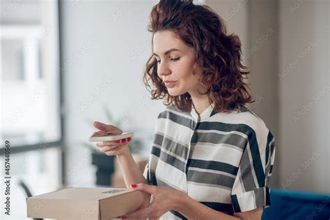 Female Involved In Scanning The QR Code With Her Gadget Stock Photo Adobe Stock