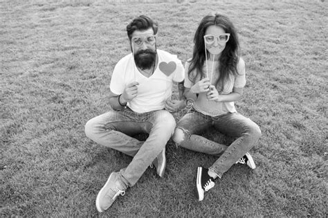 Spreading Love Romantic Couple Having Photobooth Fun On Green Grass Stock Image Image Of