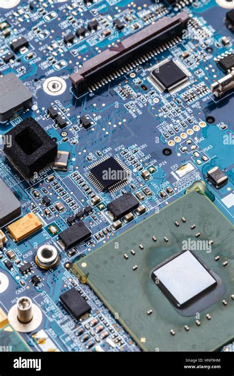 Integrated Semiconductor Microchip Microprocessor On Blue Circuit Board
