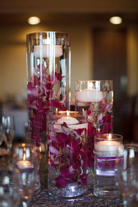 Vases With Floating Candles And Flowers