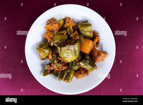 Parwal Aloo Ki Sabji Also Known As Pointed Gourd And Potato Fry Curry