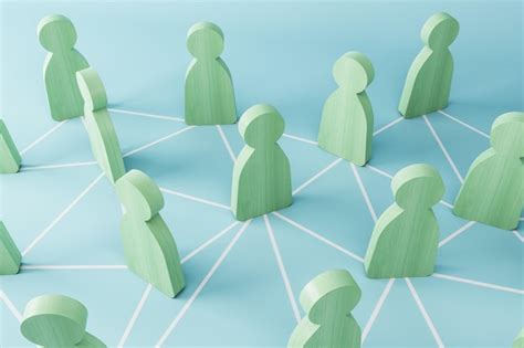 Premium Photo Team Building And Social Networking Concept With Green Wooden Figures Connected