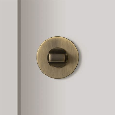 Divo Round Snib Lock Brushed Bronze By Hndl Door Hardware