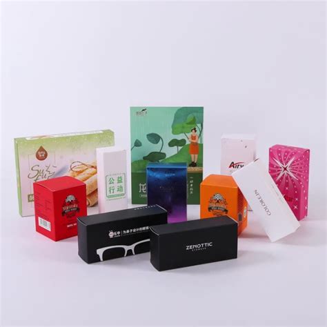 厂家闪金烫金工艺白卡纸袋纳米UV光油凹凸广告礼品手提纸袋定制 阿里巴巴