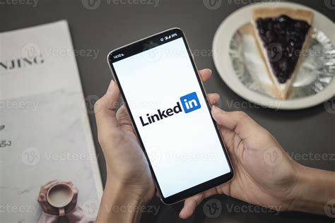 Chiang Mai Thailand 2019 Woman Holding Smartphone Showing LinkedIn Application On Mobile