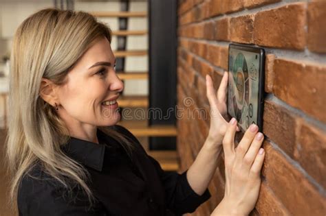 woman at home using smart screen automation domestic system stock