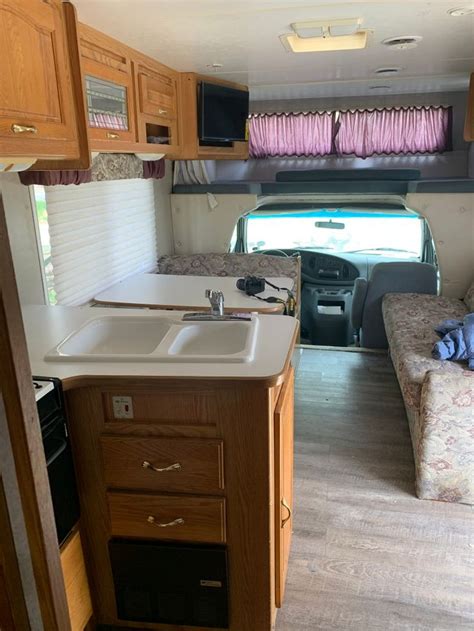 Class C RV BoHo Renovation By Camping Couple