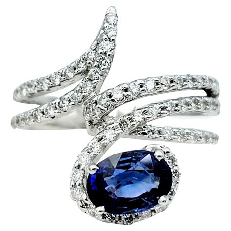 Contemporary Sapphire And Diamond Split Shank Bypass Wrap Ring In 18
