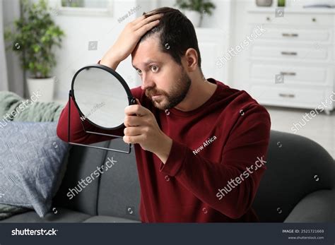 Man Hair Loss Problem Looking Mirror Stock Photo 2521721669 Shutterstock