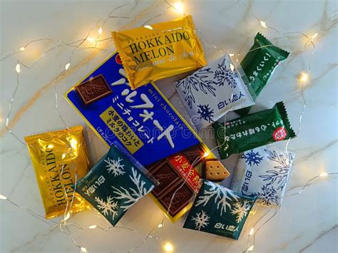 Assortment Of Japanese Sweets And Chocolates Packaged In Colorful