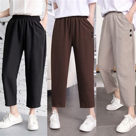 กางเกงแฟชั่นทรงขาบานความยาวเหนือข้อเท้า เป็นเอวยางยืด มีกระเป๋า ผ้าฝ้ายผ้าเย็นผ้าไม่ยับ ไม่ต้อง