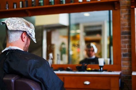 Caucasian Man In The Barber Dying His Hair To Blonde Stock Image Image Of Equipment Hairline