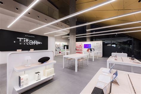 new istyle store with a shop fron within the zaha hadid s iconic facade