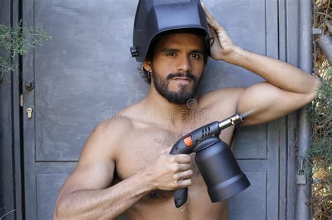 Worker Holding Welding Torch And Protective Helmet Stock Image Image Of Helmet Hispanic