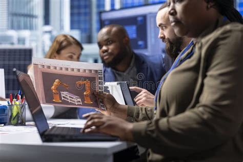 Factory Shareholders Look Over Assembly Lines Blueprints Working On