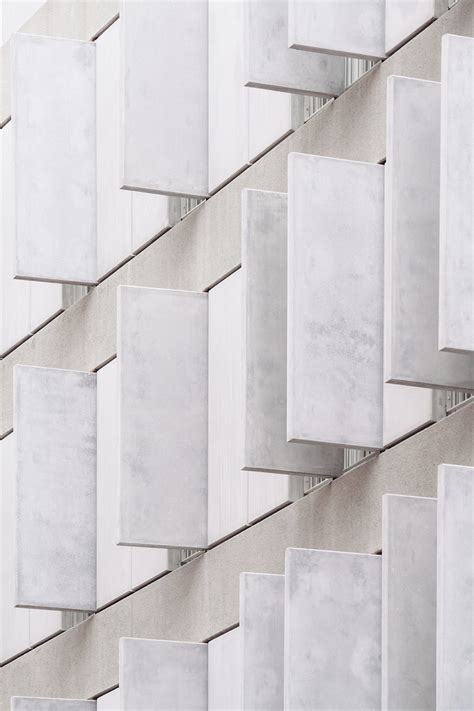 Rotating Concrete Shutters Enliven Facade Of Elcano Housing Block In Madrid