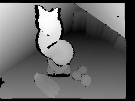 Depth Enhancement Via Low Rank Matrix Completion
