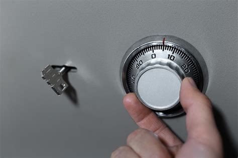 Premium Photo Close Up Of Male Hand Introduces Combination Security Code Of Safe Lock