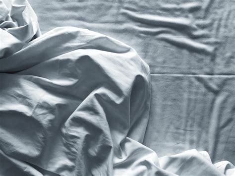 Premium Photo Crumpled White Bed Sheets