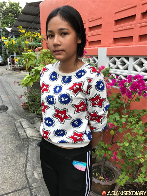 Asian Babe Thae Oo Shows Her Hairy Pussy And Her Tattoo While Stripping