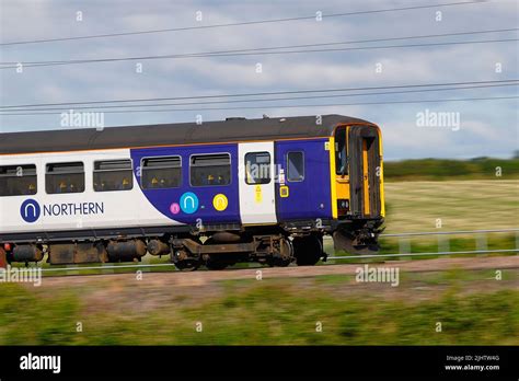A British Rail Class 158 Seen Here Passing Through Colton Junction Near