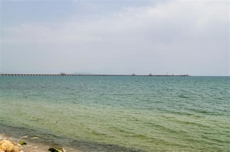 Premium Photo View Of An Oil Pipeline And A Dock For Oil Tankers