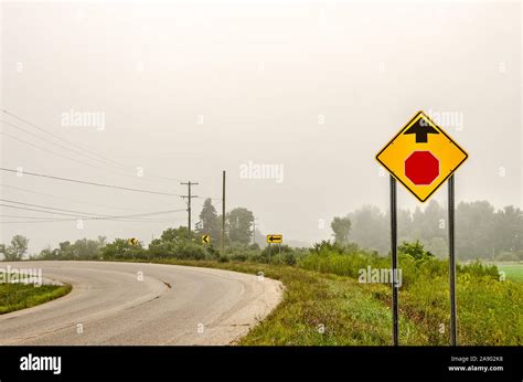 Signs On A Sharp Curve Include Arrows Pointing In The Direction Of The Curve And A Warning Of A